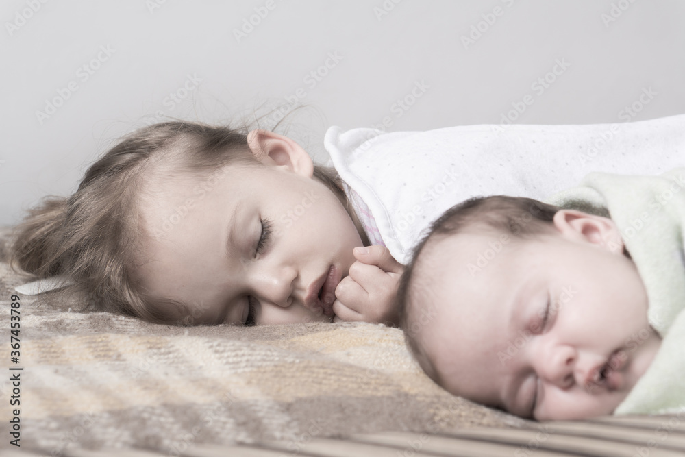 close up view of two children, newborn baby,three year old girl ...