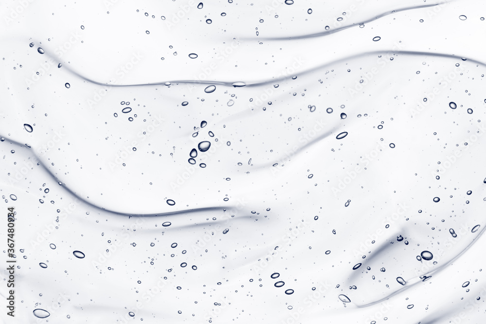 Foto de Stock Clear gel with bubbles texture. Face serum, sanitizer gel ...