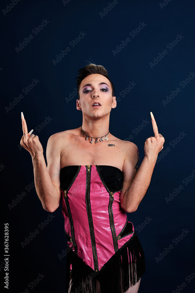 anger transgender young model making a flip off with middle finger ...