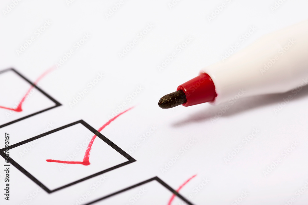 Check list and marker Stock Photo | Adobe Stock