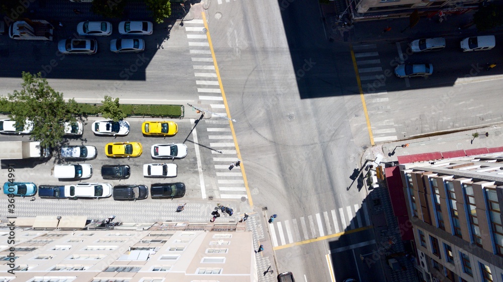 Aerial view of the crosswalk and road junction between buildings at the ...
