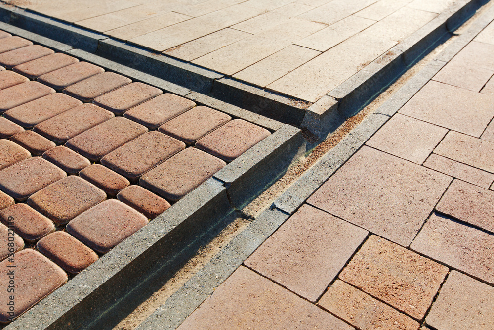 Concrete drainage gutters are connected on the sidewalk. Stock Photo ...