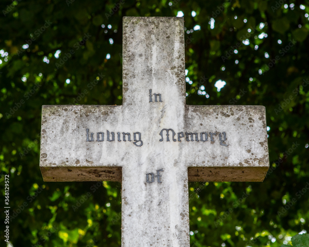 In Loving Memory of - on a headstone. Stock Photo | Adobe Stock