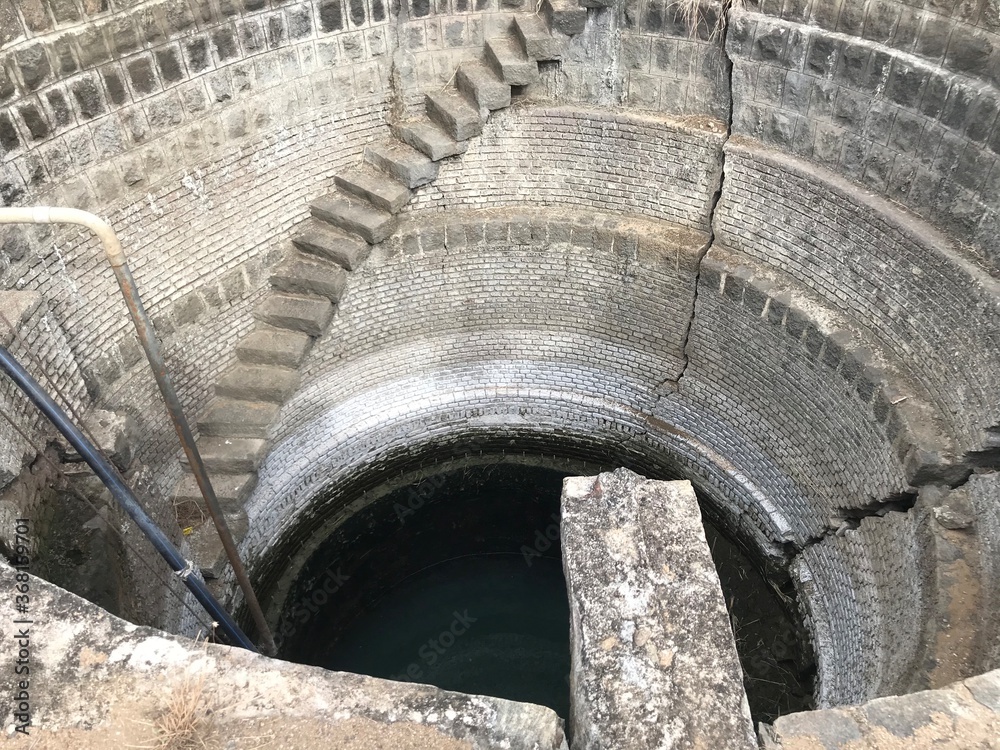 perfect round shaped stone boulders built water well for agriculture ...
