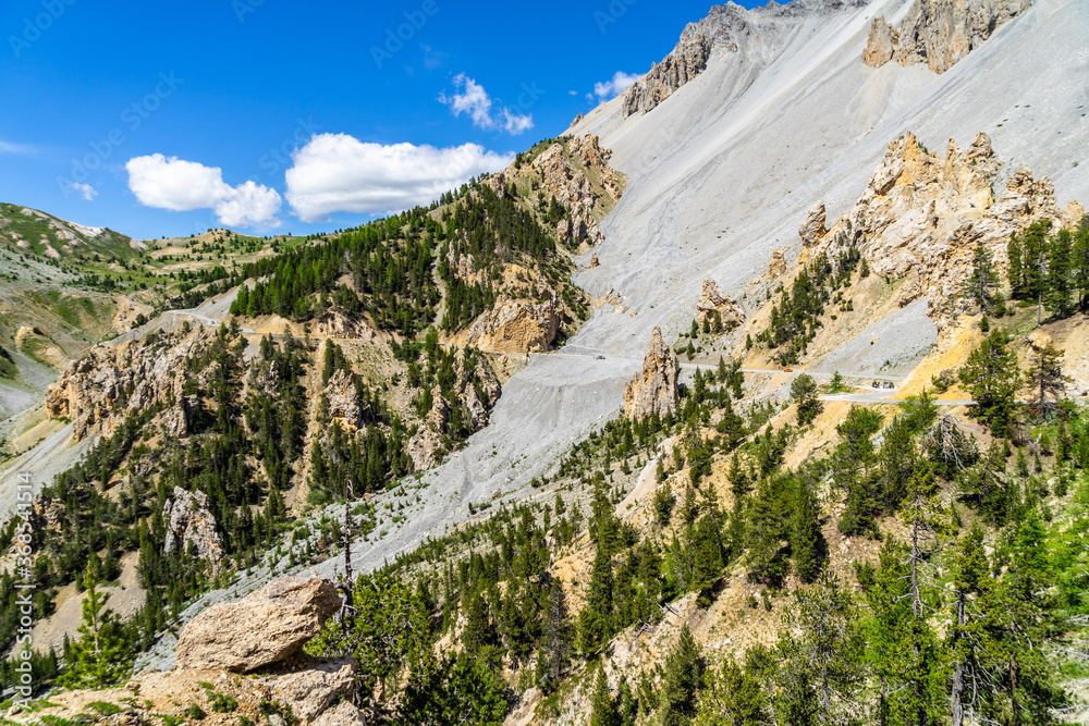 The scenic landscape of the Casse Deserte en route to the Col d'Izoard ...