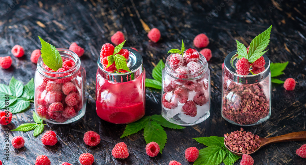 Foto de Stock Glass jars with raspberries in different forms. Fresh ...