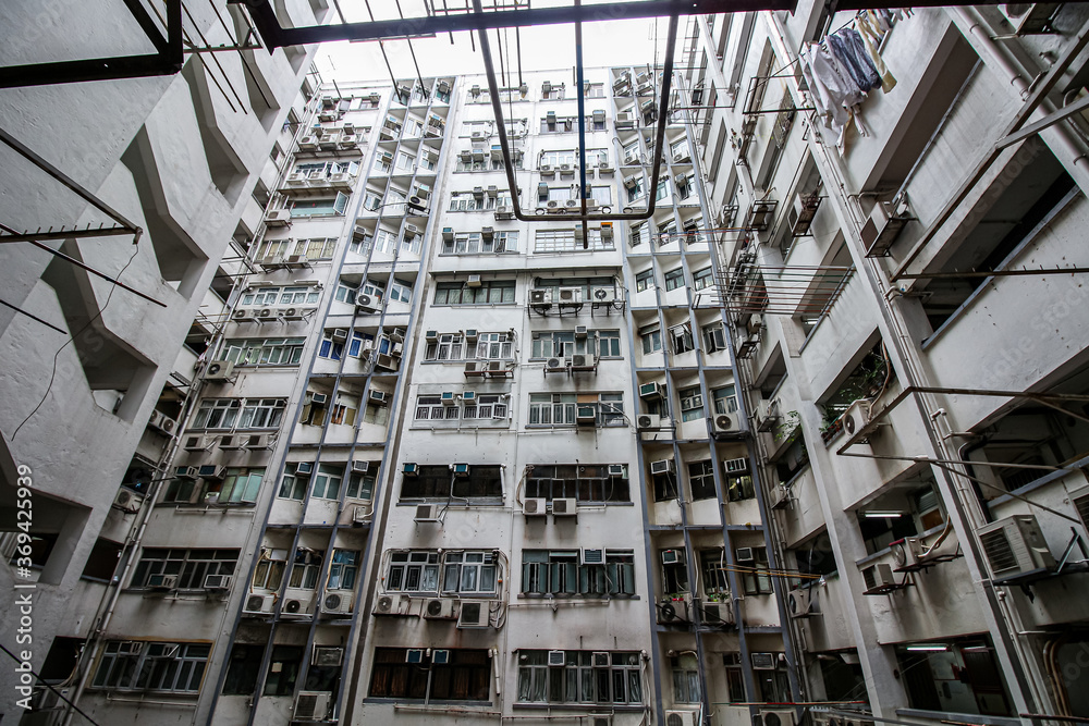 Photo Stock Low angle view of crowded residential towers in an old ...