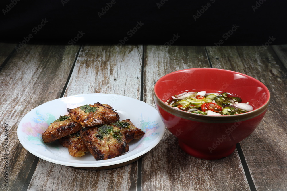 Fotografie Traditional deep fried minced pork toast or pork bun on the ...