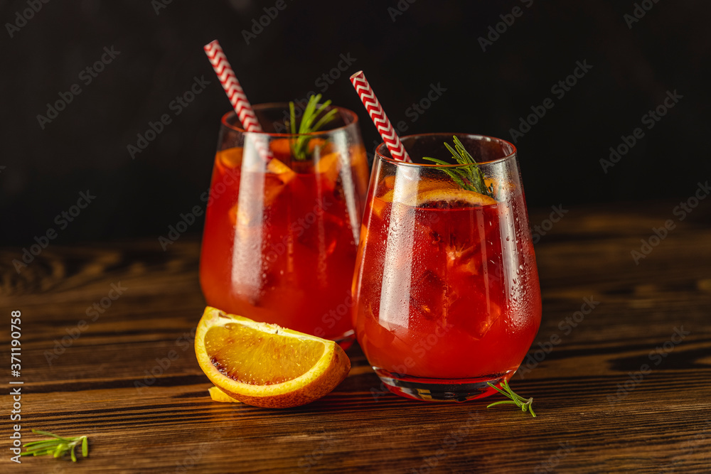 Two glasses of campari gin spritz. Cocktail of sweet, a touch of bitter ...