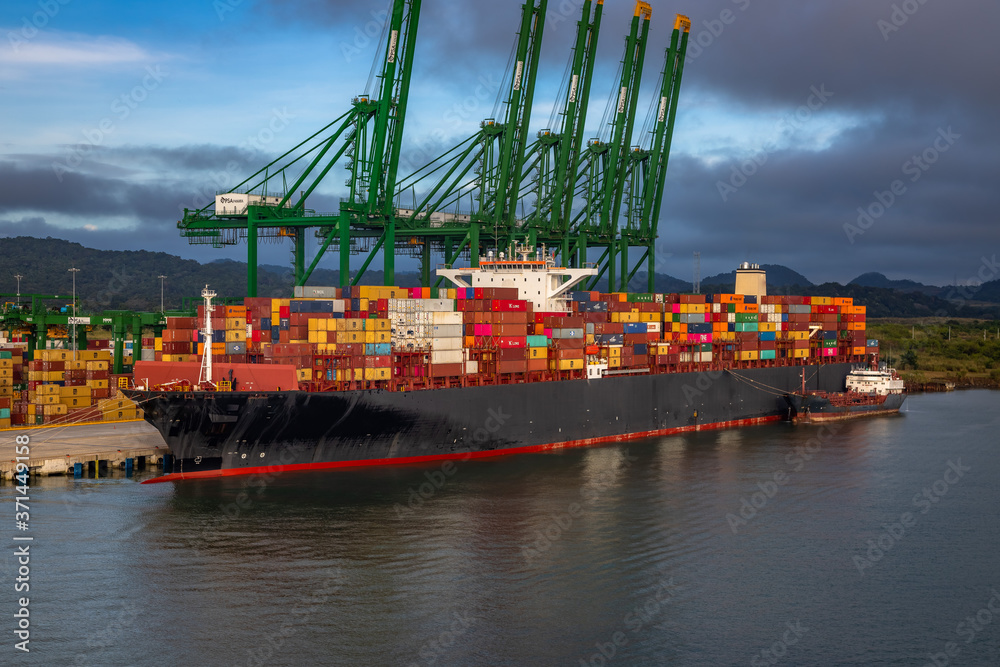 Container ship loading and unloading in Colon Container Terminal. View ...