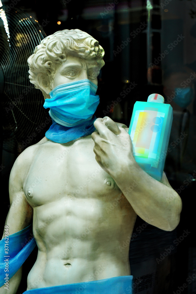 Protection from the crown virus. Mask, disinfectants. Sculpture of ...