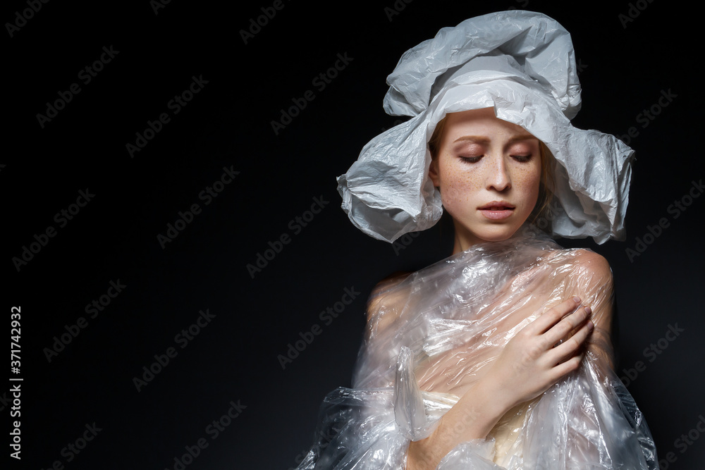 Stock-Foto „Portrait of unhappy upset girl with plastic bag on head ...