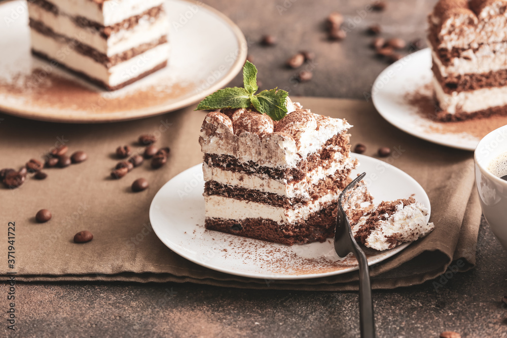 Plate with tasty tiramisu on table Stock Photo | Adobe Stock