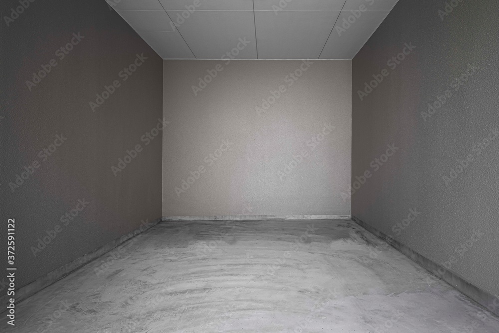 Perspective of Empty dark basement concrete room. Stock Photo | Adobe Stock