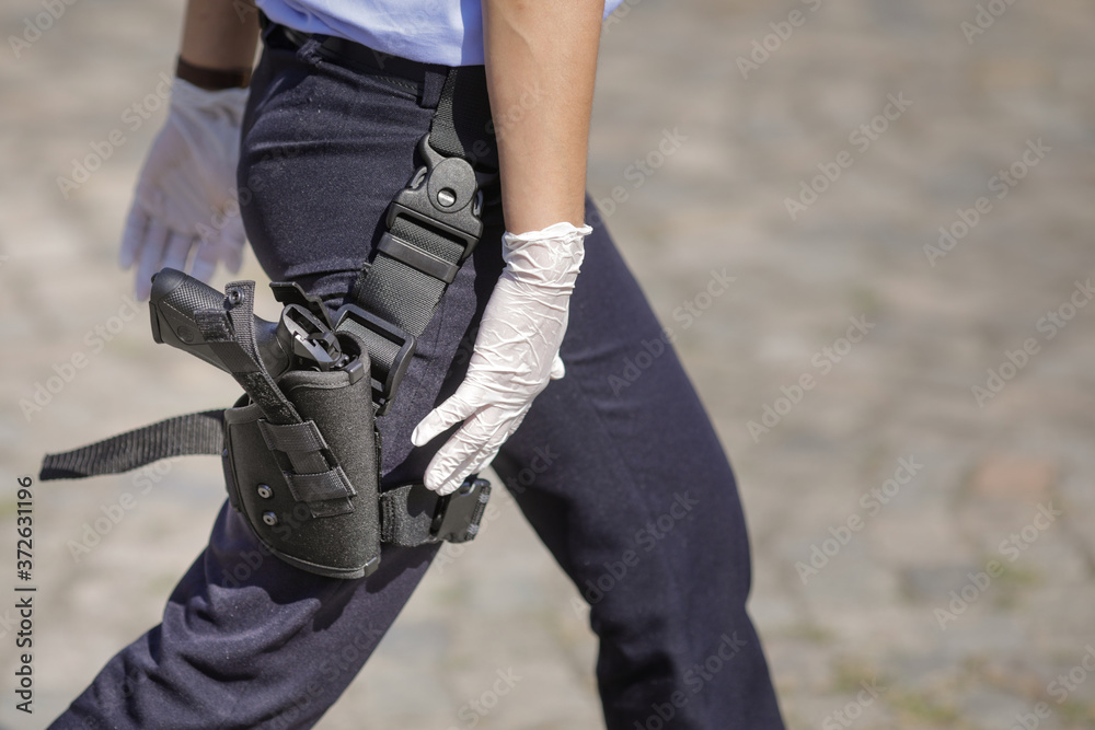 Details with a brand new Beretta PX4 gun in the holster of a Romanian ...