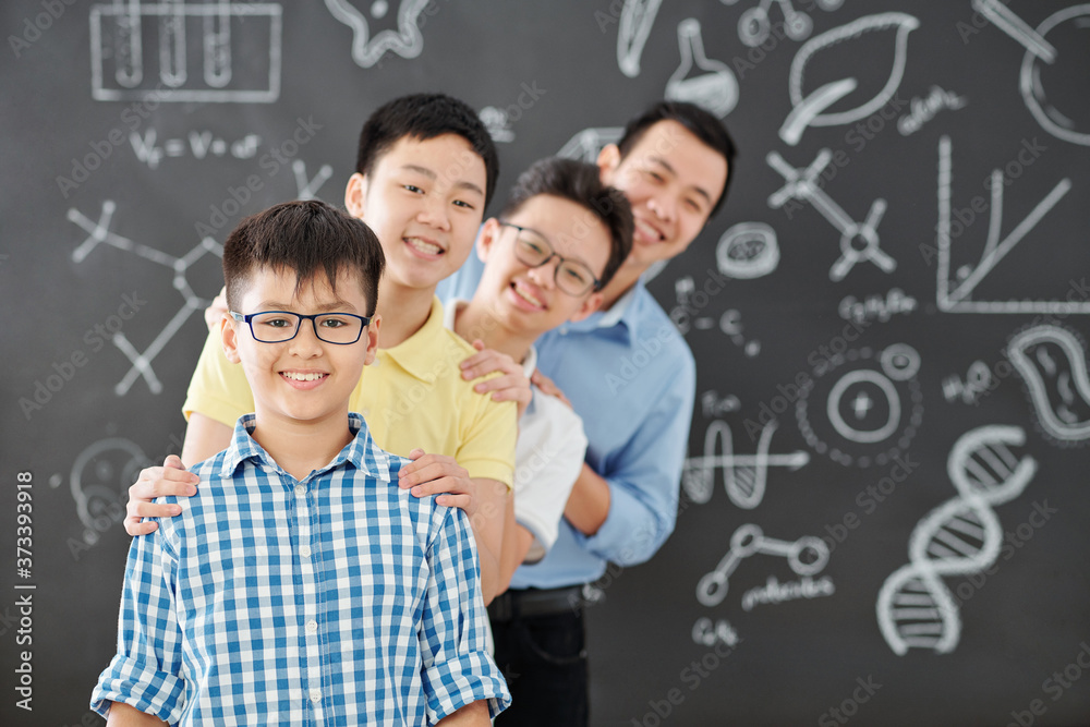 Group of Vietnamese school students and their chemistry teacher ...