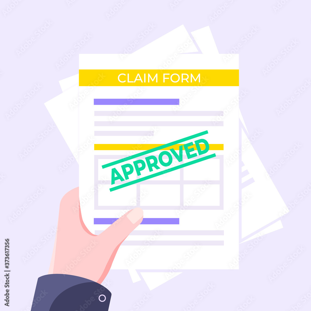 Hand holds approved claim or credit loan form, paper sheets and ...