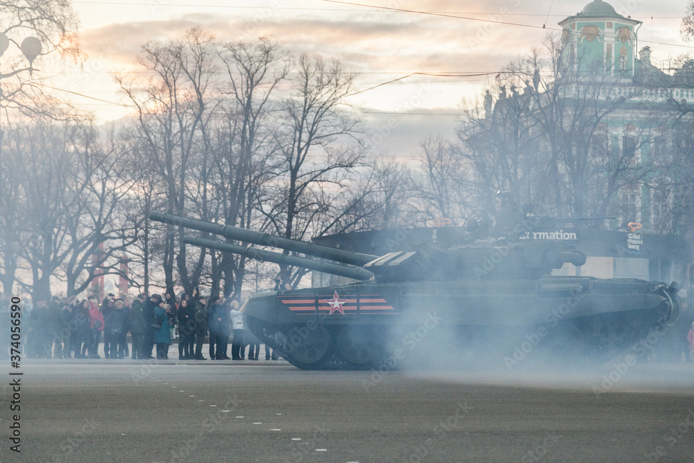 Russian tanks in smoke at the Victory Day parade on Palace Square in St ...