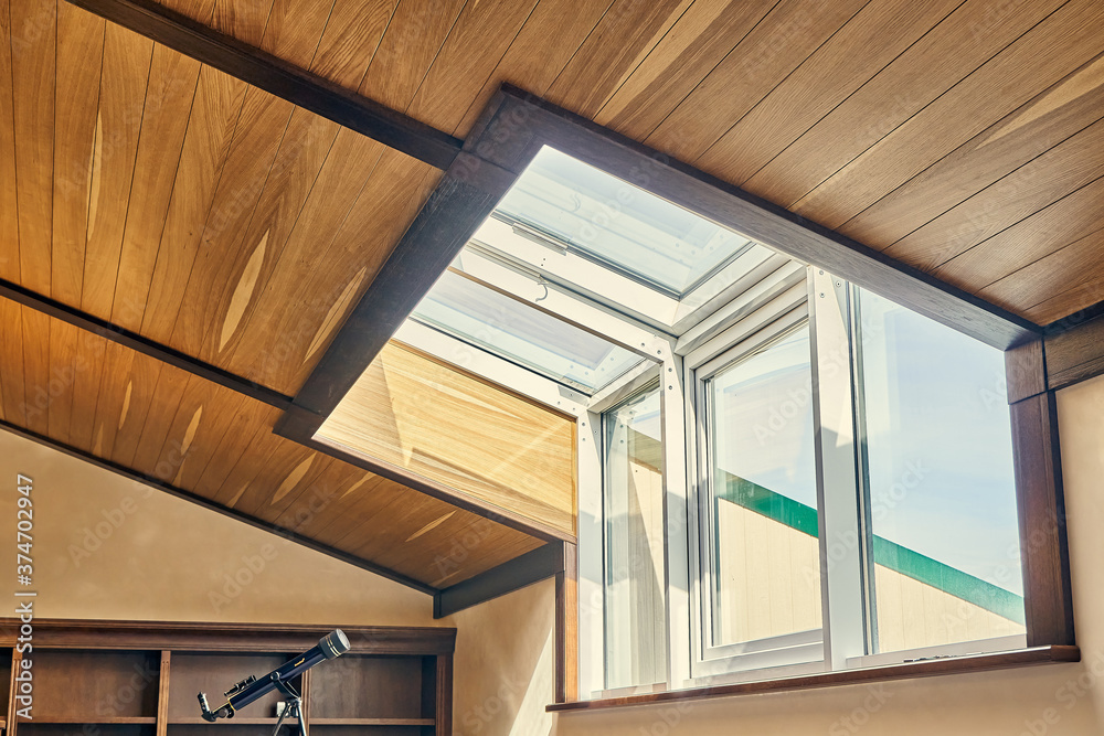 Large attic window with wooden ceiling. Stargazing telescope Stock ...