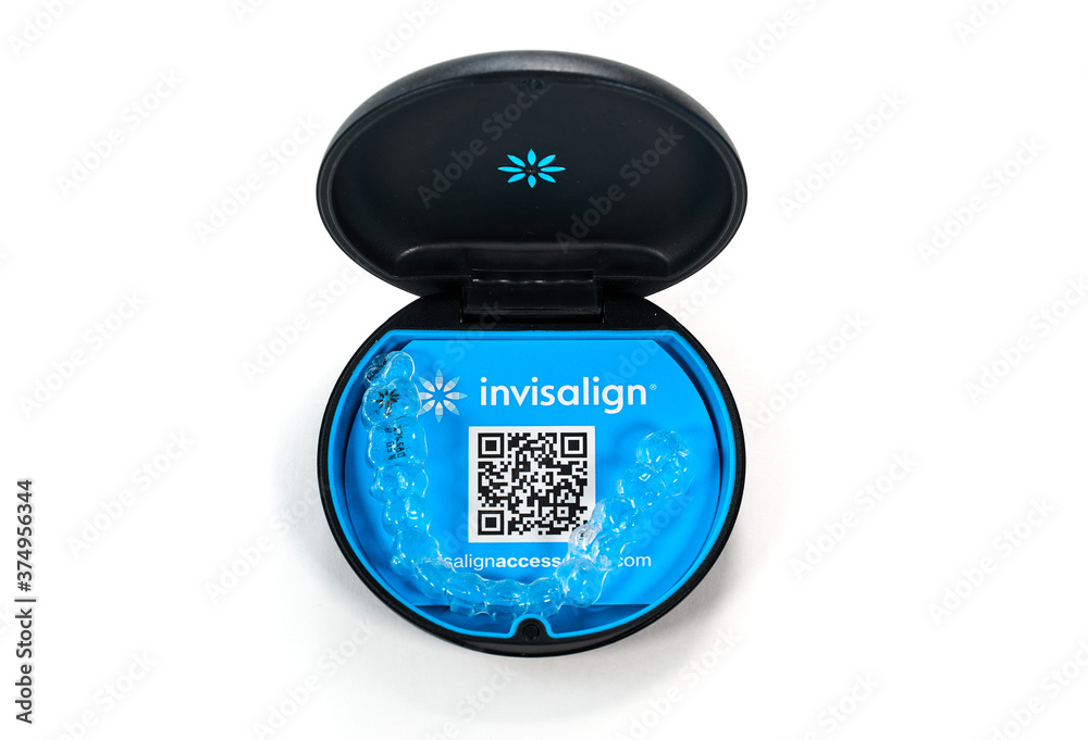 Align Technology invisalign aligners in a case over white background ...