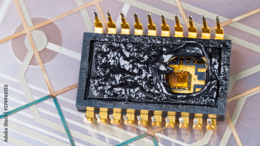 Inside of burned integrated circuit on flexible PCB membrane detail ...