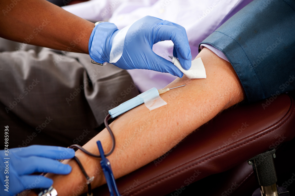 Blood Bank: Nurse Removing the Needle Stock Photo | Adobe Stock