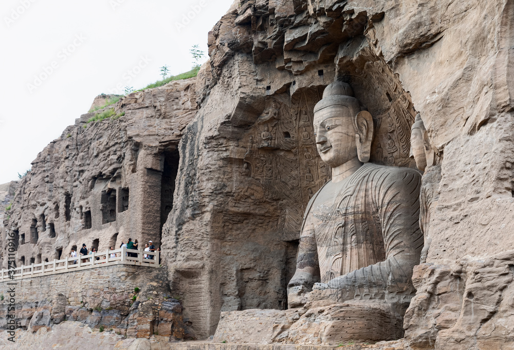 Iconic seated Buddha statue in Cave 20 & caves in weast part at Yungang ...