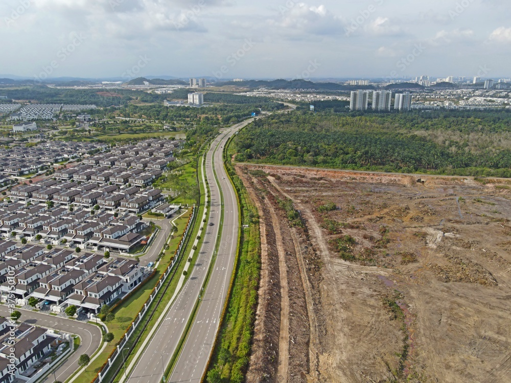 An aerial view of land clearing and deforestation at Iskandar Puteri of ...