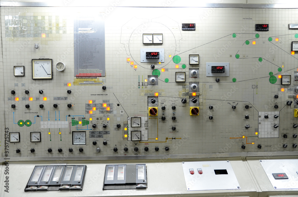 Machine operating console in factory. Old control panel on production ...