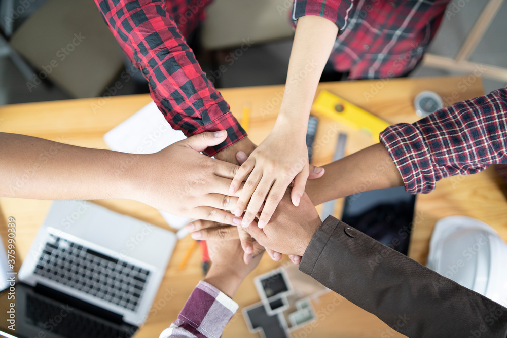 Teamwork concept,Business team standing hands together in office.people ...
