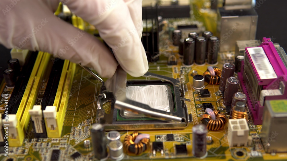 Inserts a central processor onto the motherboard. The processing system ...