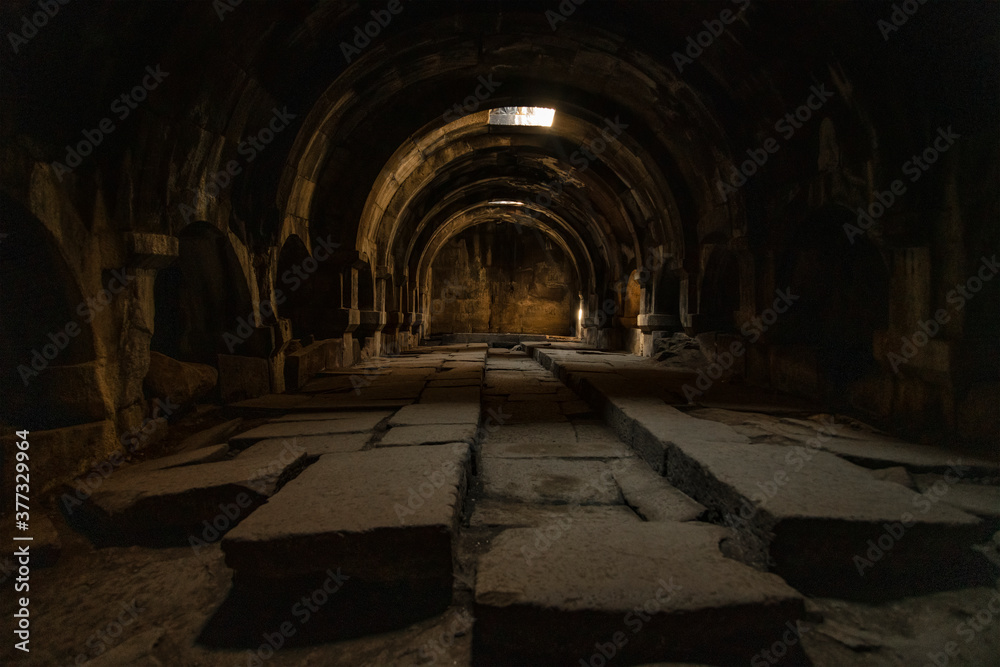 Old stone hall in castle. Inside the arch with columns. Stock Photo ...