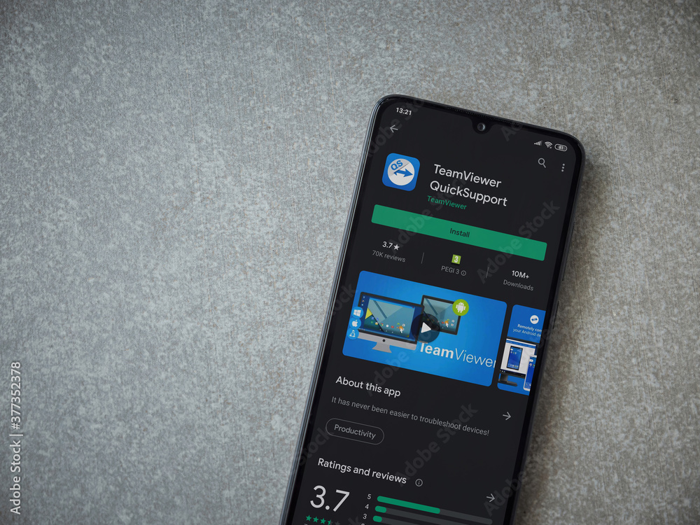 TeamViewer QuickSupport app play store page on the display of a black ...