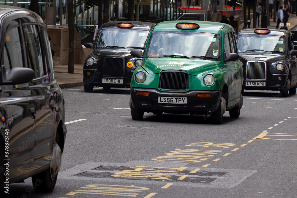 Four London Taxi Cabs Stock Photo | Adobe Stock