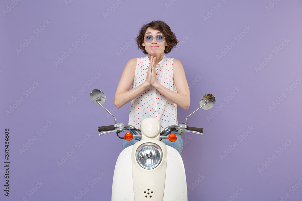 Pleading begging young brunette woman 20s in white dotted shirt glasses ...