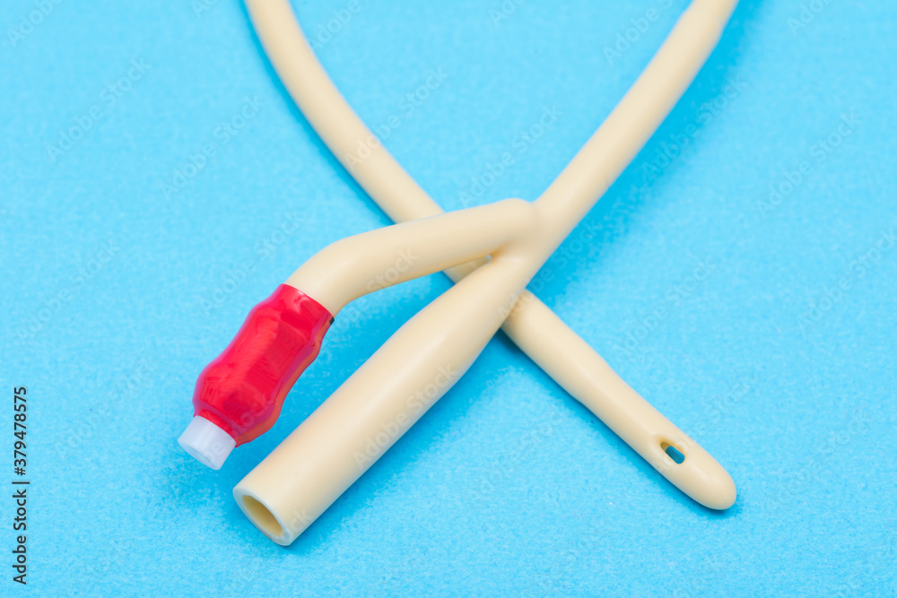 Sterile silicone-elastomer coated latex Foley urinary catheter with ...