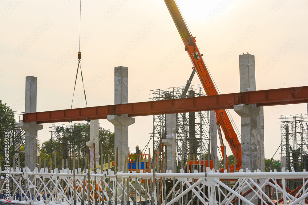 Construction workers installation steel structure girder runway beam ...