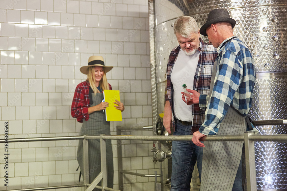 Winemaker and cellar master in the winery Stock Photo | Adobe Stock