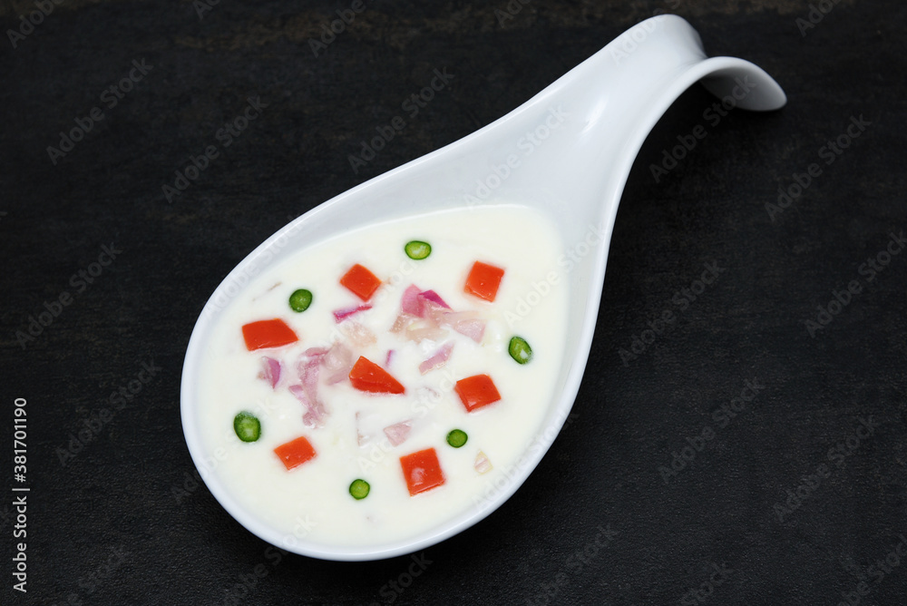 Fresh Vegetable Raita or curd Mumbai North India. Indian food yogurt ...