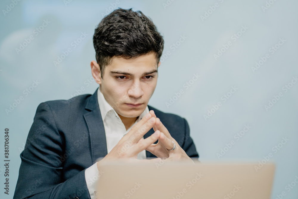 Smart young man handsome brunette short haircut European appearance ...