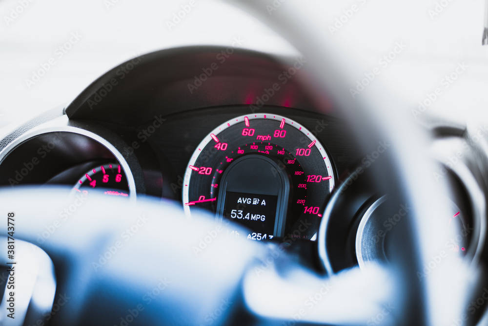 Average fuel consumption display on a dashboard Stock Photo | Adobe Stock
