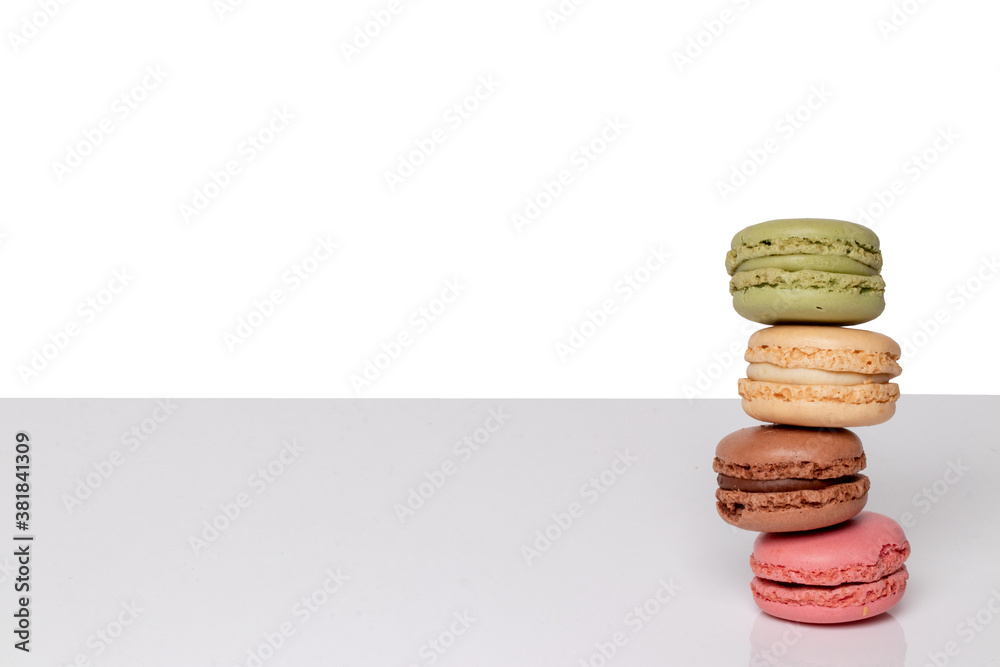 Pastries, desserts and sweets. Close-up on a heap of four colorful ...