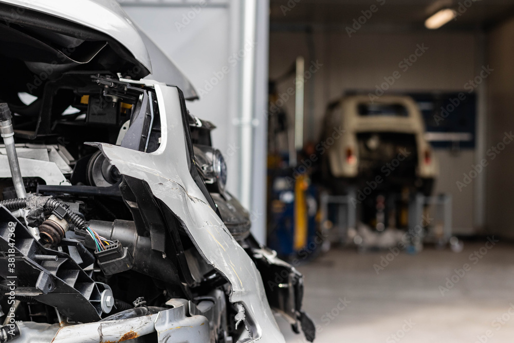 Close up shot of the remains of a wrecked vehicle after a serious car ...