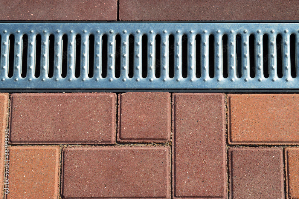 Pavement decoration with decorative rectangular stone tiles with a ...