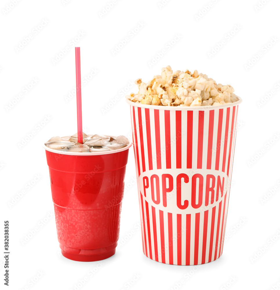 Tasty popcorn and cola on white background Stock Photo | Adobe Stock