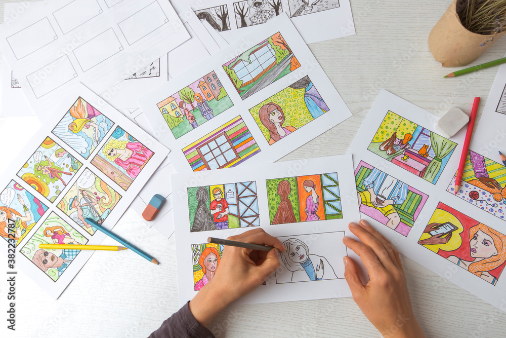 Artist animator draws a color storyboard. Sketches of illustrations for ...