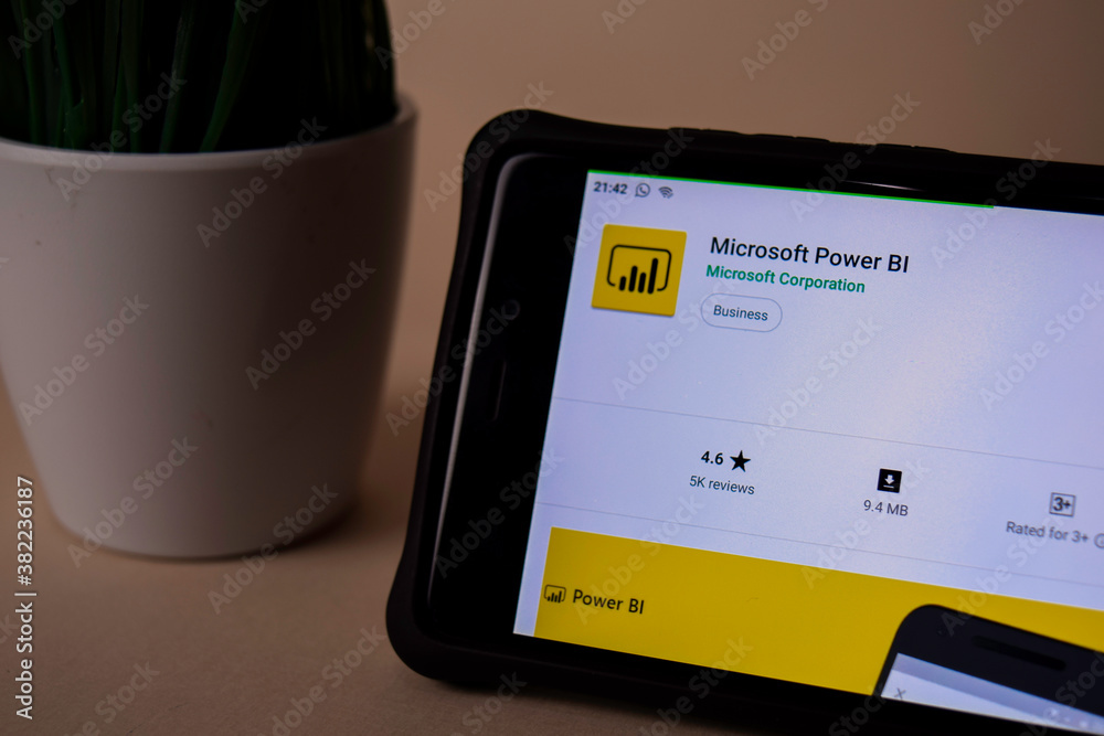Microsoft Power BI dev application on Smartphone screen. Power BI is a ...