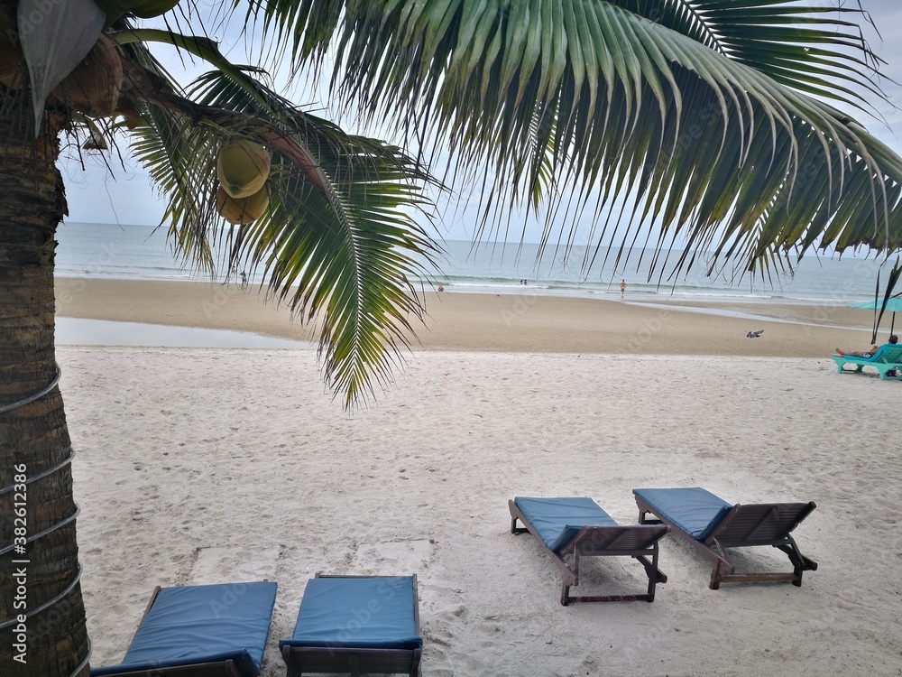 beach bed beside swimming pool at hotel terrace. The famous and ...