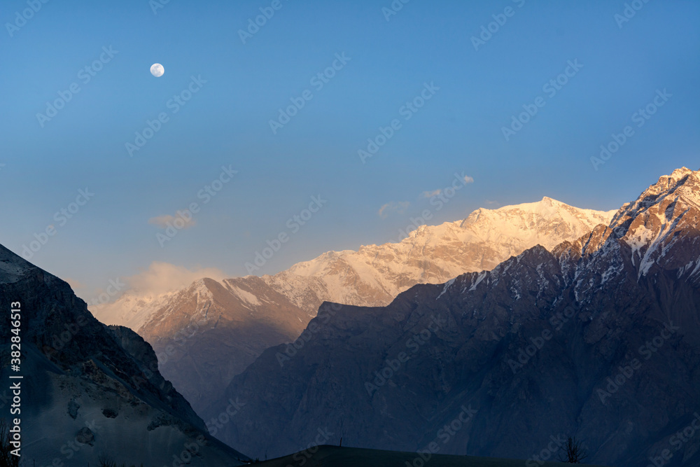 cold desert of katpana with snow mountains in background in northern ...