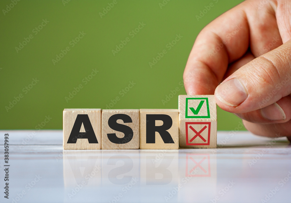 hand turn wooden block with red reject X and green confirm tick as ...